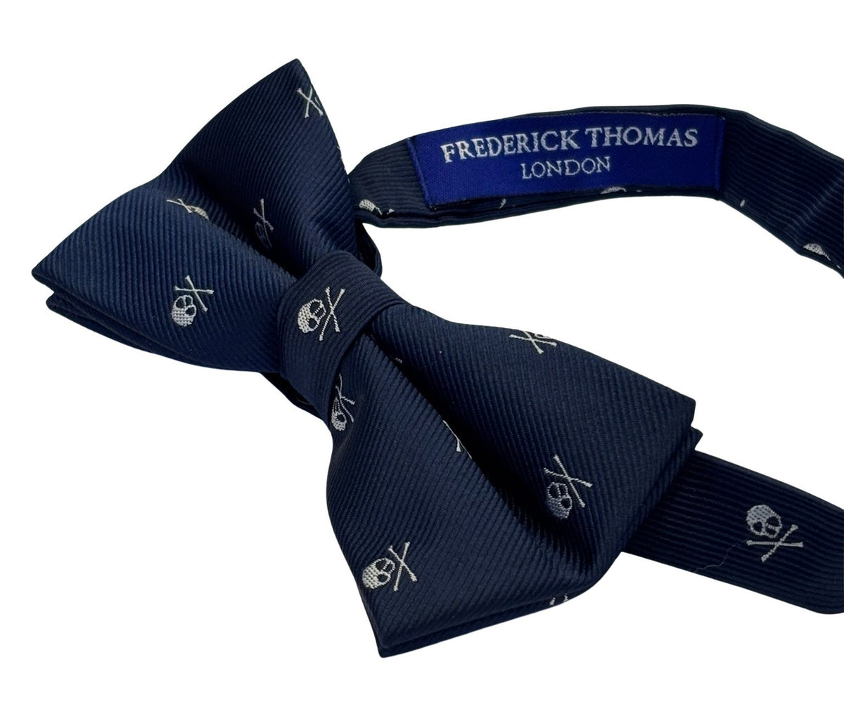 handmade navy bow tie with white skull and crossbone design by ...