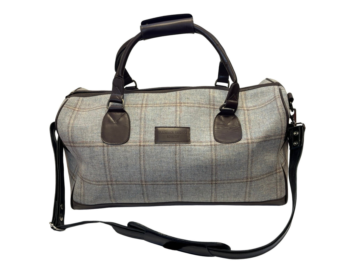 Luxury weekend overnight bag in light blue check with leather handles ...