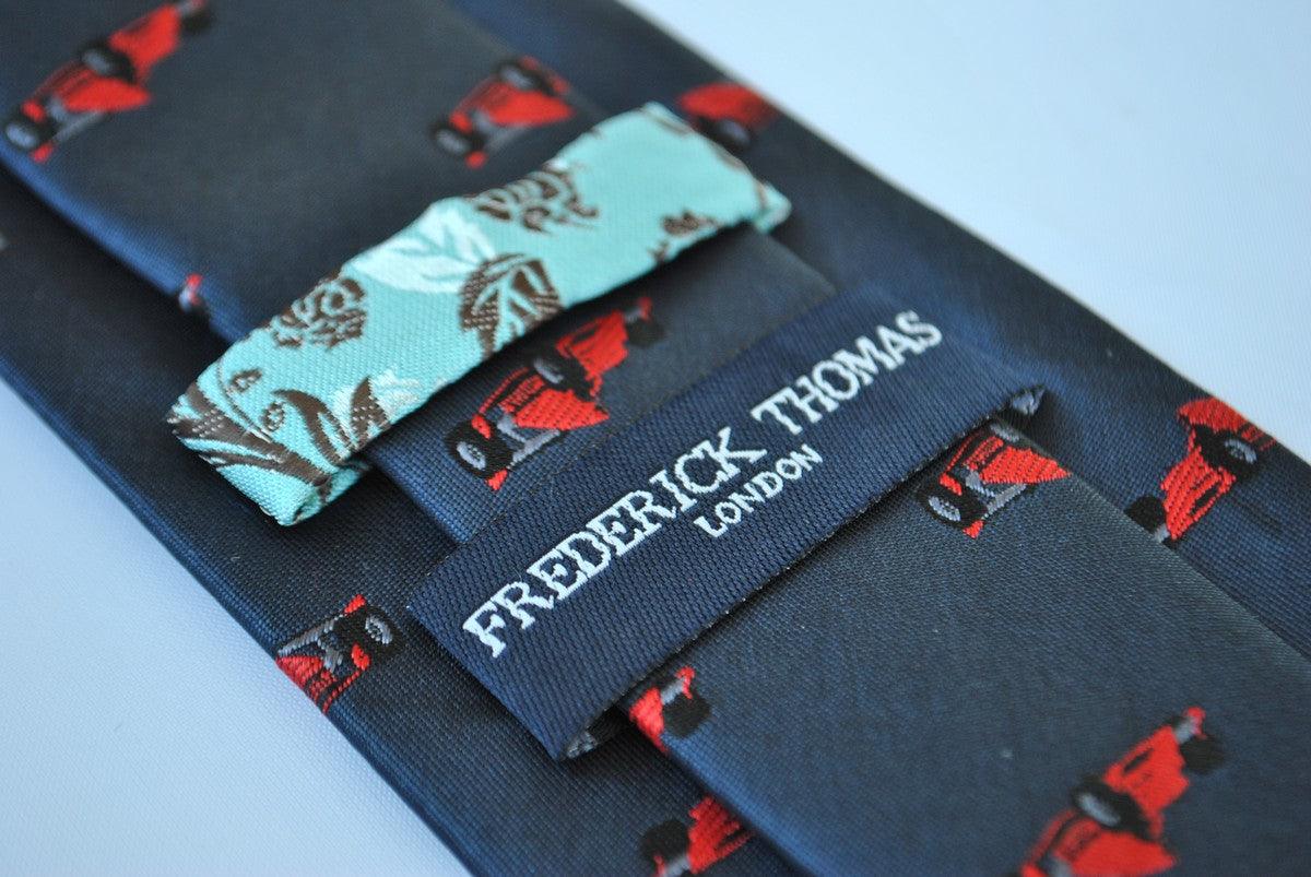 handmade navy blue tie with F1 racing car design with signature floral ...